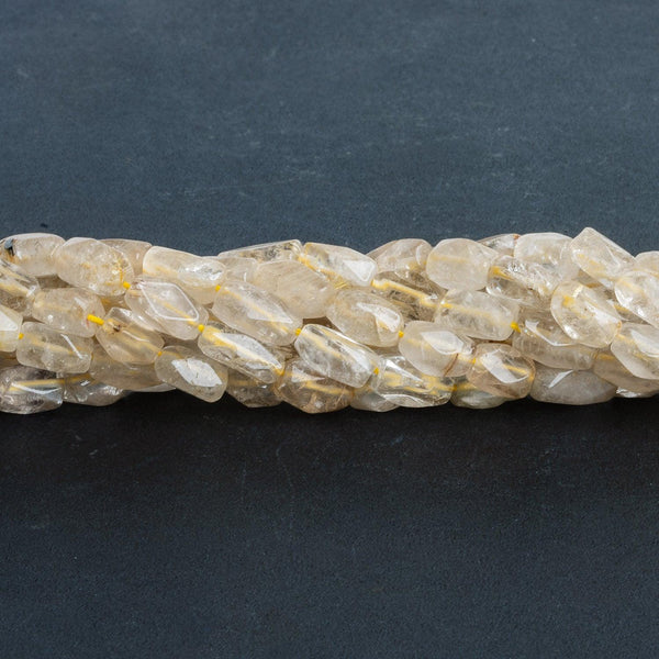 Rutilated Quartz Cornerless Rectangles 15 inch 40 beads – The Bead Traders